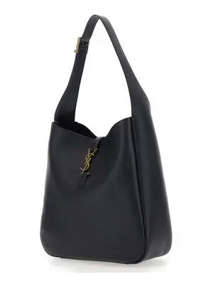 Saint Laurent Le 5 À 7' Shoulder Bag With Claw Cassandre Closure And Adjustable Strap In Hammered Leather - Black