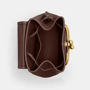 COACH Kisslock Backpack - Brass/maple