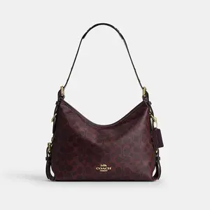 COACH OUTLET Laurel Shoulder Bag With Buckles In Signature Canvas - Gold/black Currant