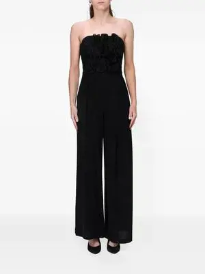 HANITA Ruffle-trimmed Glitter-effect Jumpsuit - Black
