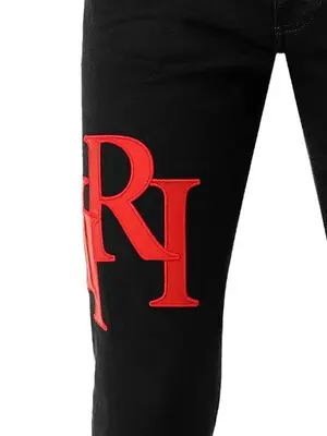 Amiri Monogram Print Skinny Jeans