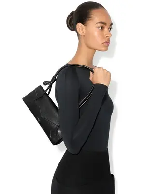 Alaïa Small Le Teckel Flap Bag In Shiny Leather - Black