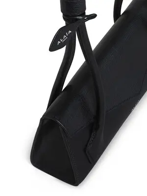 Alaïa Small Le Teckel Flap Bag In Shiny Leather - Black