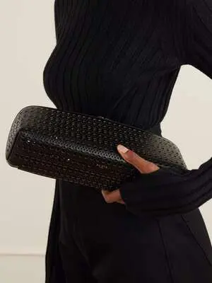 Alaïa Delta Laser-cut Leather Clutch
