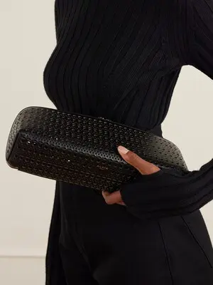 Alaïa Delta Laser-cut Leather Clutch