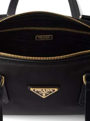 Prada Re Nylon And Leather Medium Top Handle Bag With Padlock