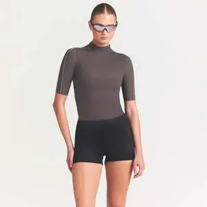 SKIMS Mock Neck Short Sleeve T Shirt | Grey | | Nike Weightless Layers