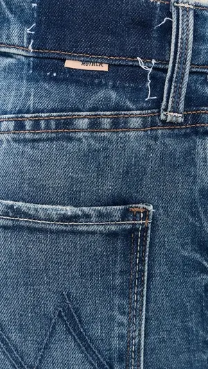 MOTHER The Tomcat Roller Sneak Jeans