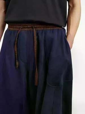 CROQUIS Oversized Curved-leg Trousers