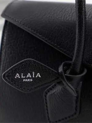 Alaïa Le Teckel Flap Leather Handbag - Black