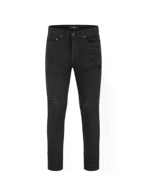 Amiri Distressed Ribbed-panel Jeans - Black