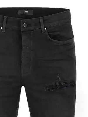 Amiri Distressed Ribbed-panel Jeans