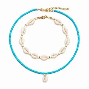 GEMINI JEWELRY Two-piece Genuine Cowrie Shell And Beaded Pendant Necklace Set Blue