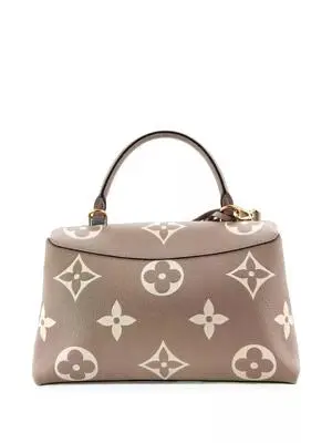 LOUIS VUITTON Madeleine Handbag Bicolor Monogram Empreinte Giant Mm Satchel