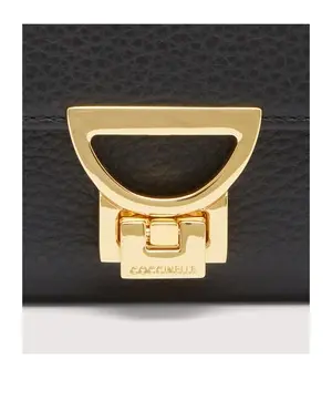 COCCINELLE Logo Engraved Foldover Top Wallet