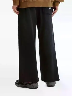FINGERCROXX Logo-embroidered Raw-edge Trousers