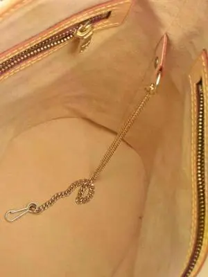 LOUIS VUITTON 1998 Nomade Petit Bucket Bag