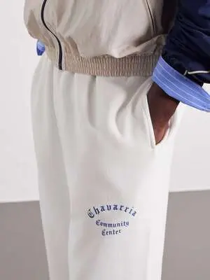 WILLY CHAVARRIA Community Center Distressed Logo-print Cotton-jersey Shorts
