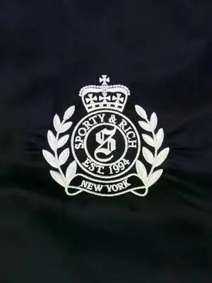Sporty & Rich Health & Wellness Crest Varsity Jacket