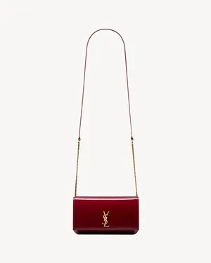 Saint Laurent Cassandre Phone Holder In Patent Leather - Grenade