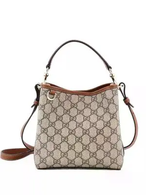 Gucci Gg Emblem Gg Coated Canvas Small Bucket Bag - Brown
