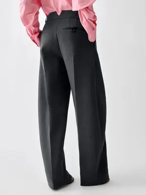 Jacquemus Curved-leg Trousers
