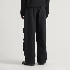 Studio Nicholson Logo Casual Pants