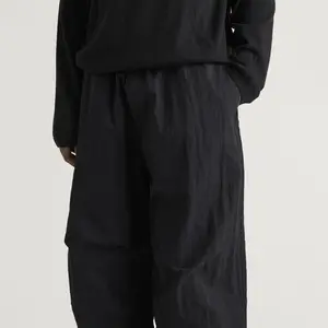 Studio Nicholson Logo Casual Pants