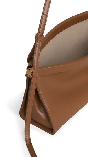 Alaïa Le Click East West Medium Bag In Calfskin