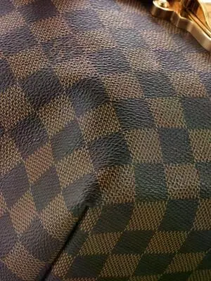 LOUIS VUITTON Clapton Damier And Leather Backpack