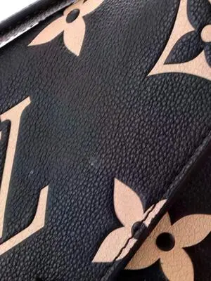 LOUIS VUITTON Pochette Metis Bicolor Monogram Empreinte Giant Crossbody Bag