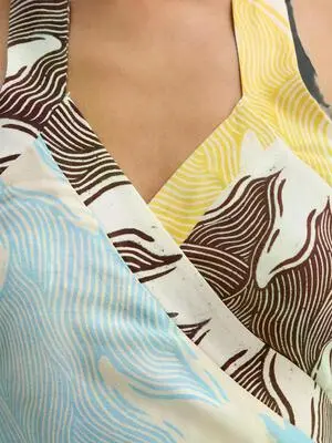 NEVER FULLY DRESSED Graphic-print Halterneck Top