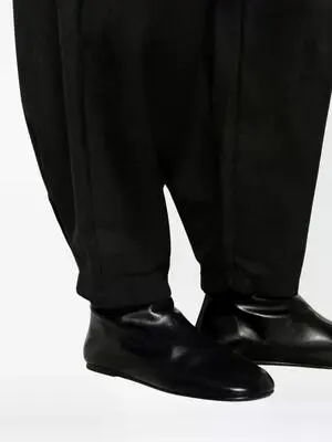 HUI MILANO Ardor Tapered-leg Trousers - Black