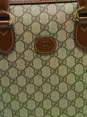 Gucci Gg Supreme Interlocking G Briefcase - Neutrals
