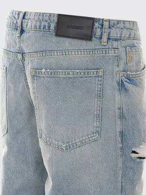 REPRESENT Distressed Cotton Denim Flared Jeans With A Worn-out Effect