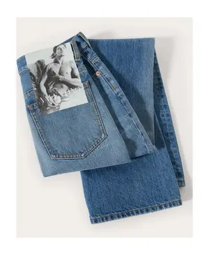 Valentino Garavani Washed Denim Jeans With Archive 1985 Print