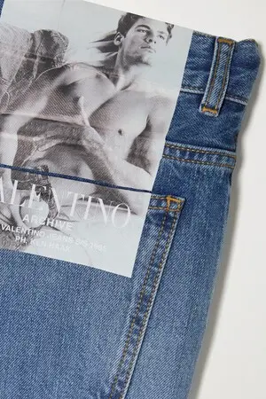Valentino Garavani Washed Denim Jeans With Archive 1985 Print