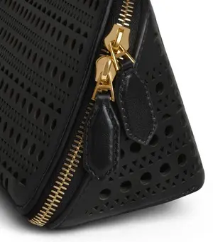 Alaïa Leather Perforated Delta Clutch Bag - Black