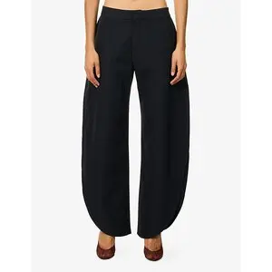 Alaïa Petal Curved-leg Wool Denim Trousers