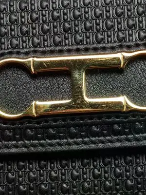 Carolina Herrera Initials Insignia Monogram-embossed Clutch Bag