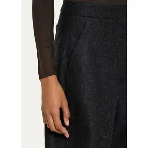 Alaïa Round Wool Barrel-leg Pants