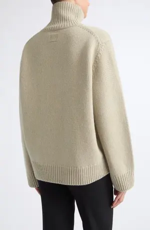 TOTEME Oversized Lambswool Turtleneck Sweater