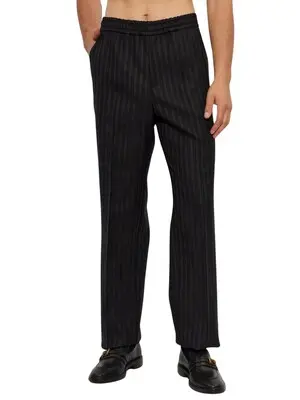 Versace Pleated Monogram Pants By