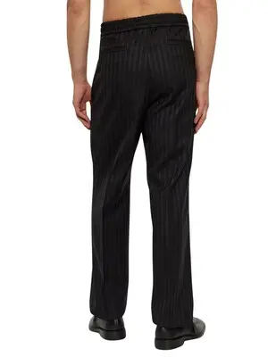 Versace Pleated Monogram Pants By