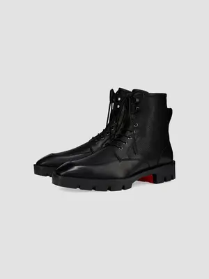 CHRISTIAN LOUBOUTIN Caracolo Lion Leather Boots