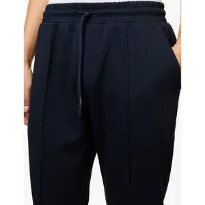 ARNE Interlock Tapered Woven Jogging Bottoms
