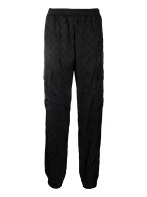 MISBHV Monogram-print Trousers - Black