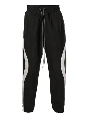 MOSTLY HEARD RARELY SEEN Wave Stripe-print Track Pants - Black