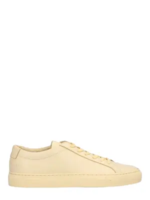 COMMON PROJECTS WOMAN By COMMON PROJECTS Low-Top Sneakers Yellow