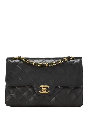 CHANEL Quilted Lambskin Curved Flap Bag